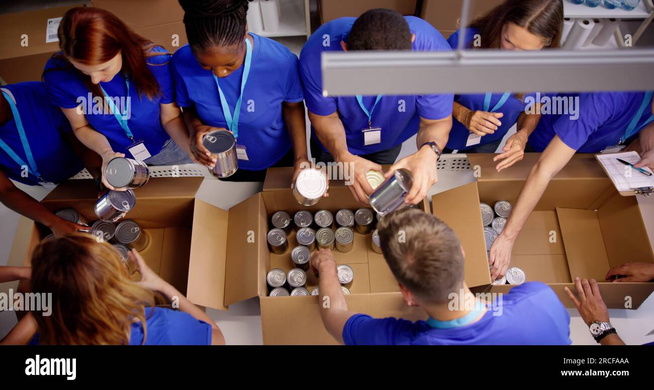 Food Bank Humanitarian Aid In Donation Boxes. Volunteer Community Stock ...