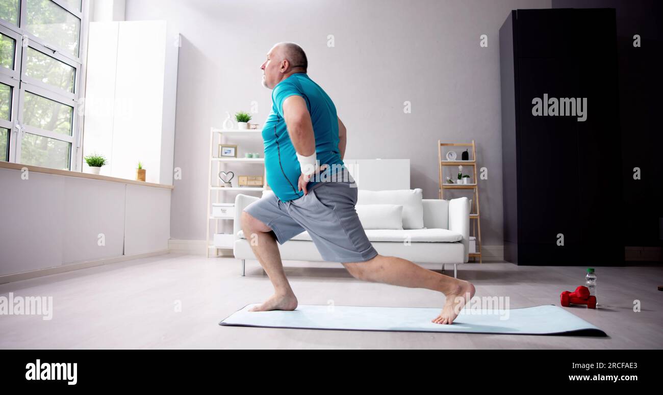 Funny Man Fitness Exercise Workout In Home Gym Stock Photo - Alamy