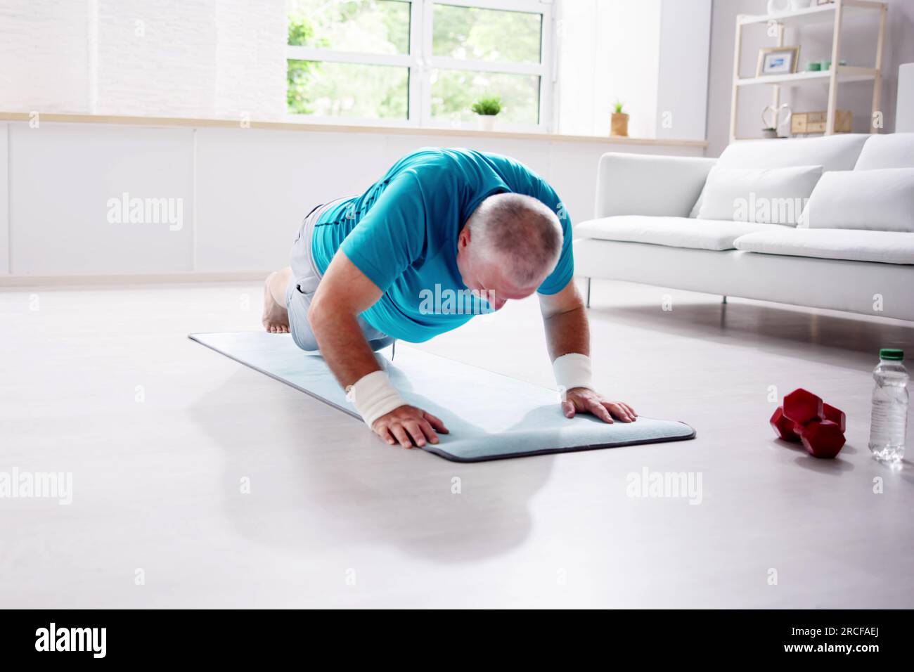 Funny Home Fitness Workout. Man Doing Sport Stock Photo - Alamy