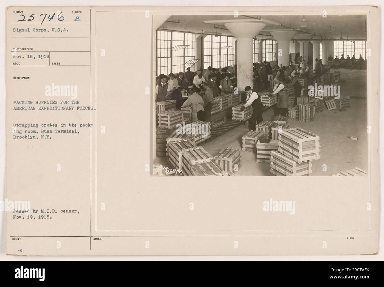 Soldiers in the packing room at Bush Terminal in Brooklyn, NY, secure ...
