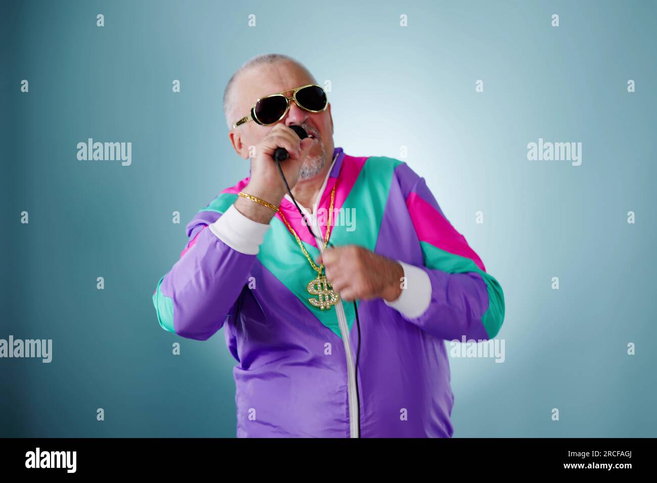 Rich Man In Disco Club Singing. Gold Chain Stock Photo - Alamy