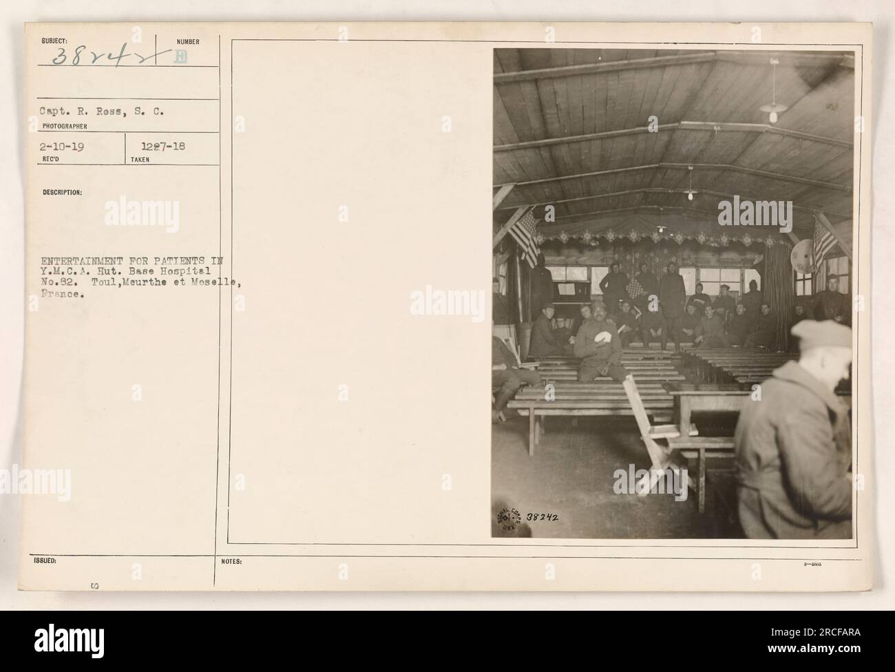 Captain R. Ross of the United States Army is seen entertaining patients ...