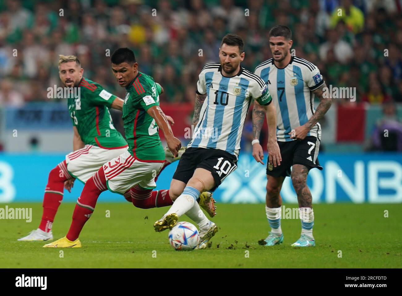 Lusail, Qatar, 26, November, 2022. Lionel Messi from Argentina dribbles ...