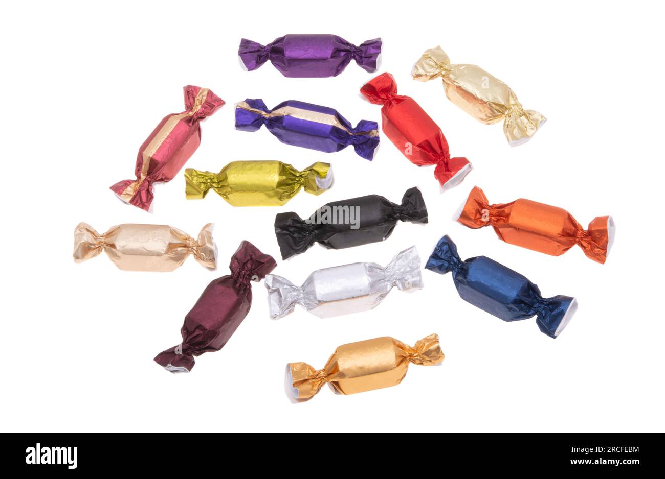 chocolate candies in wrapper isolated on white background Stock Photo ...