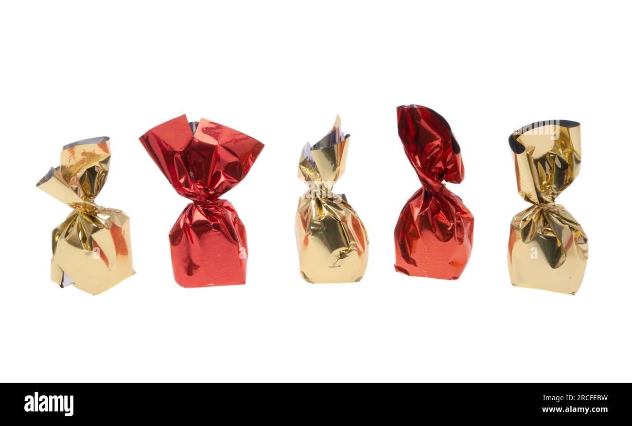 chocolate candies in wrapper isolated on white background Stock Photo ...