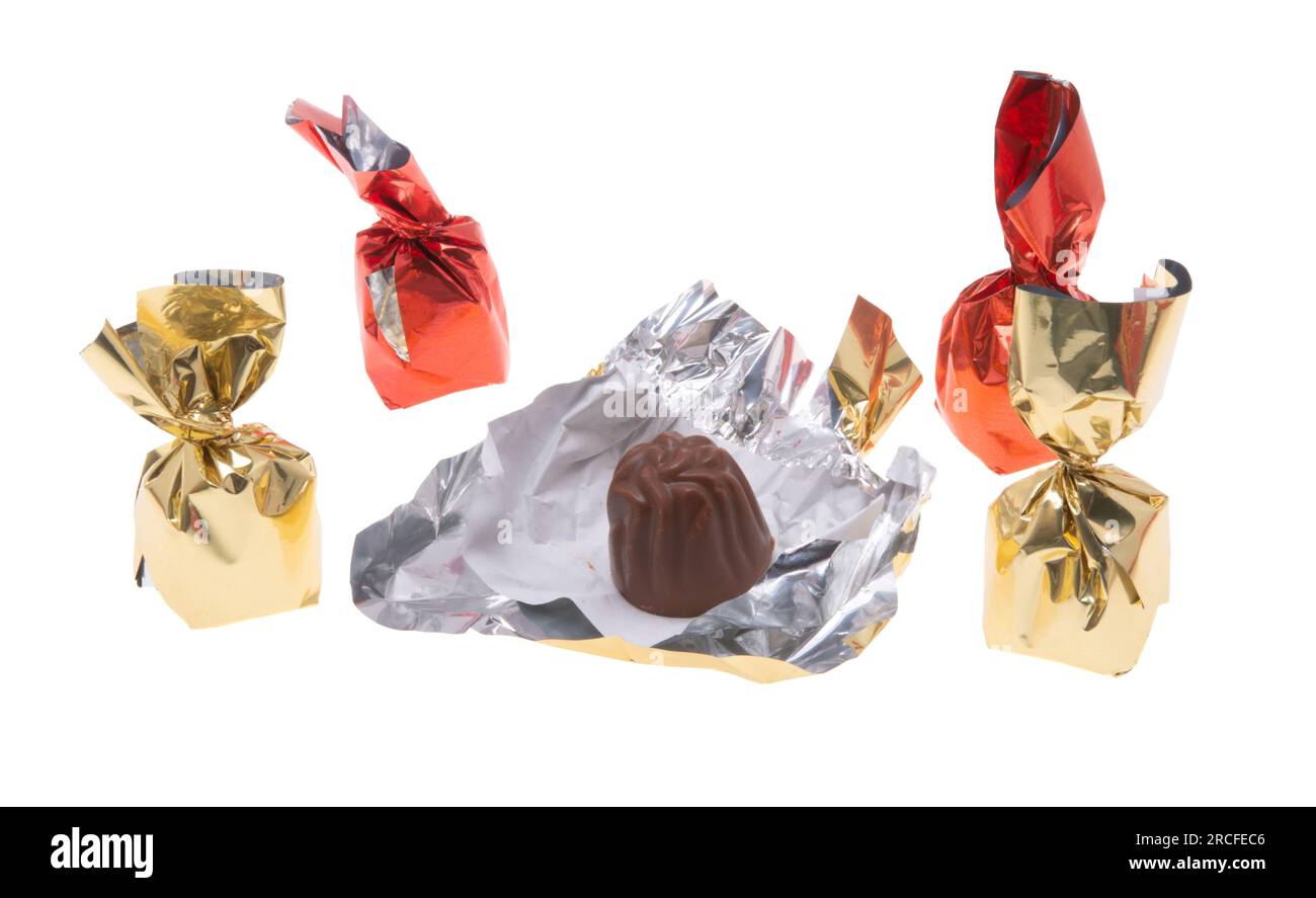chocolate candies in wrapper isolated on white background Stock Photo ...