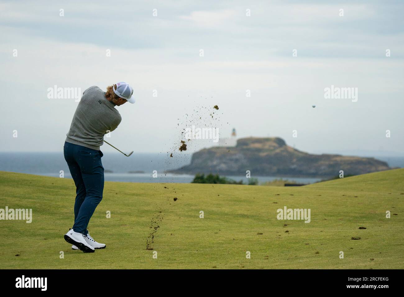 North Berwick, East Lothian, Scotland, UK. 14th July 2023. Sam Burns plays approach to the 13th ...