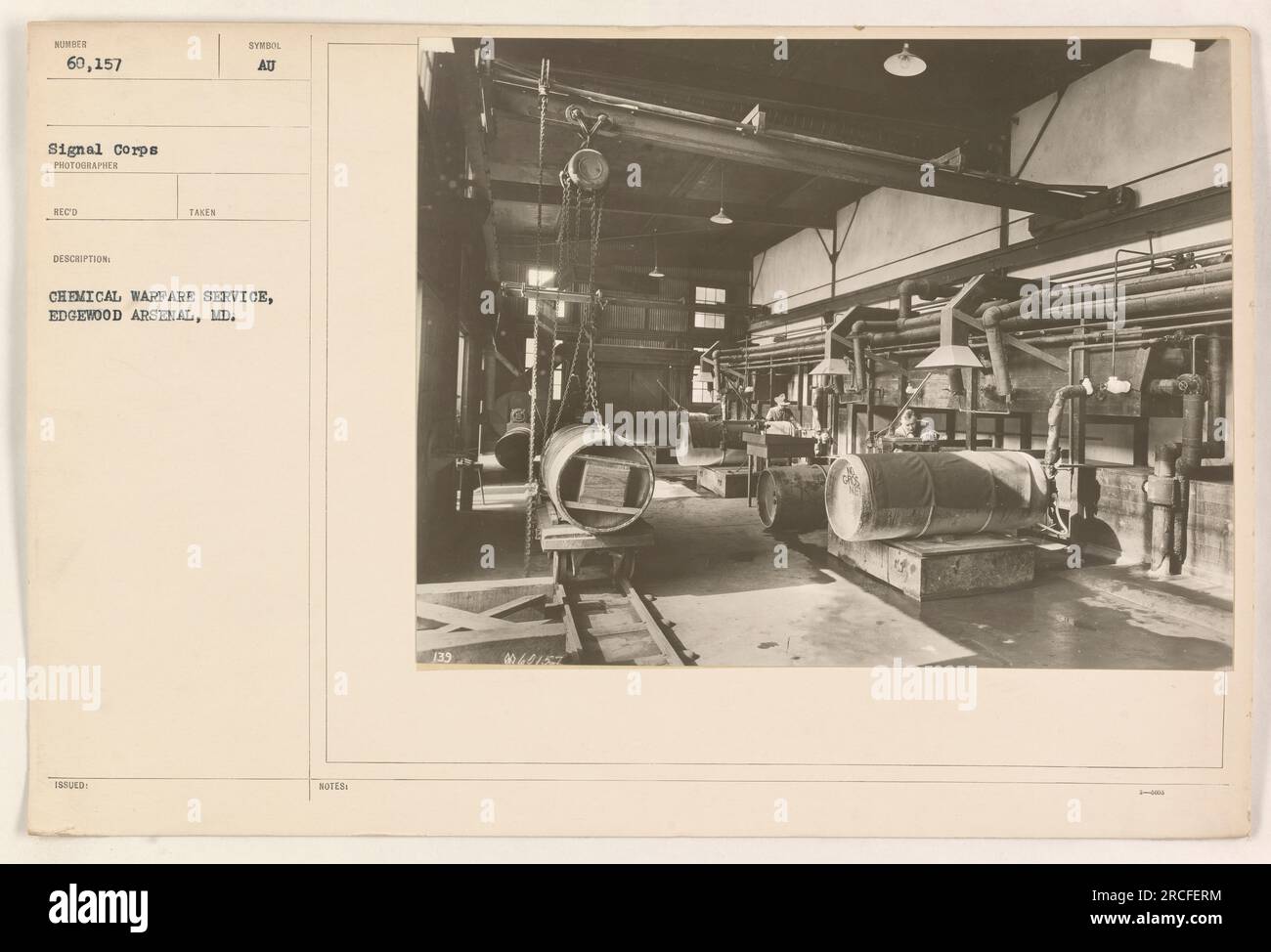 A soldier from the Chemical Warfare Service at Edgewood Arsenal, MD, is ...