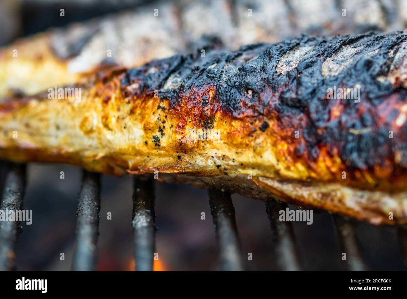 Grilled fish on charcoal grill. Fresh fish barbecue Stock Photo - Alamy
