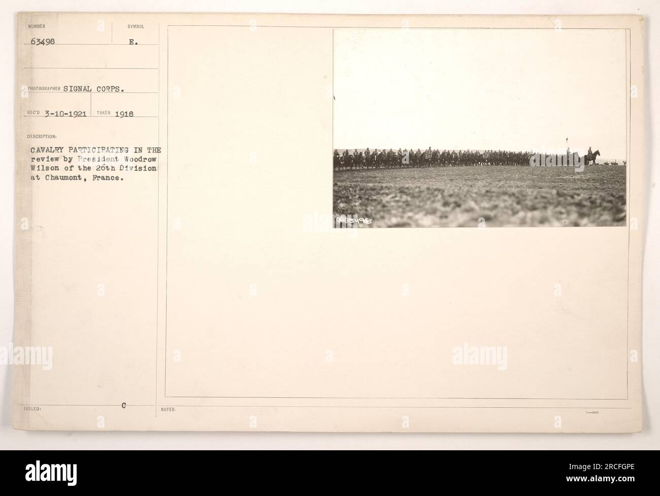 Cavalry troops riding their horses during a review by President Woodrow ...