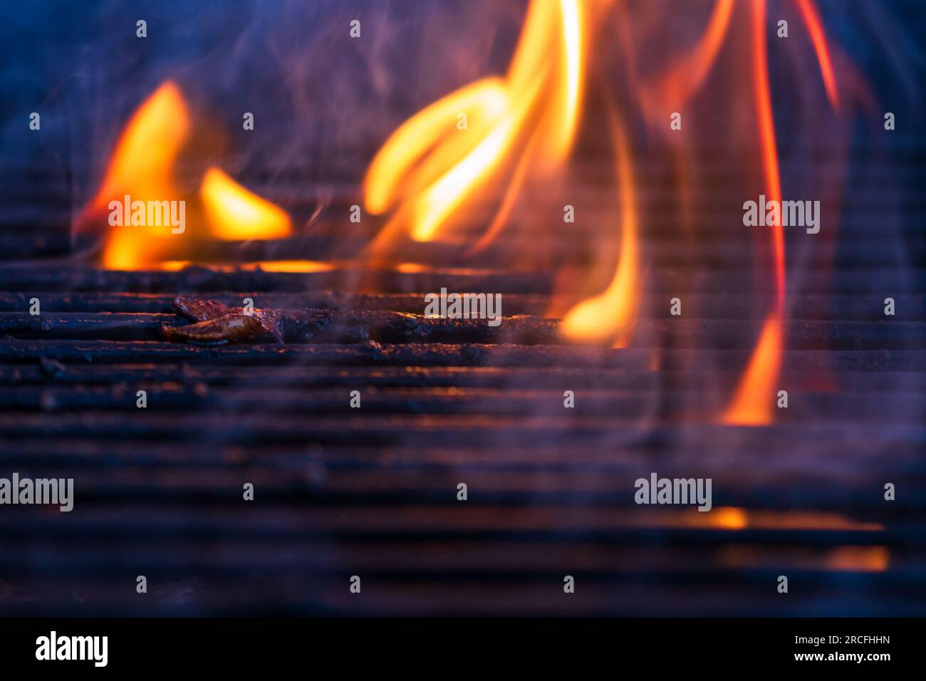 Empty hot charcoal barbecue grill with bright flame Stock Photo - Alamy