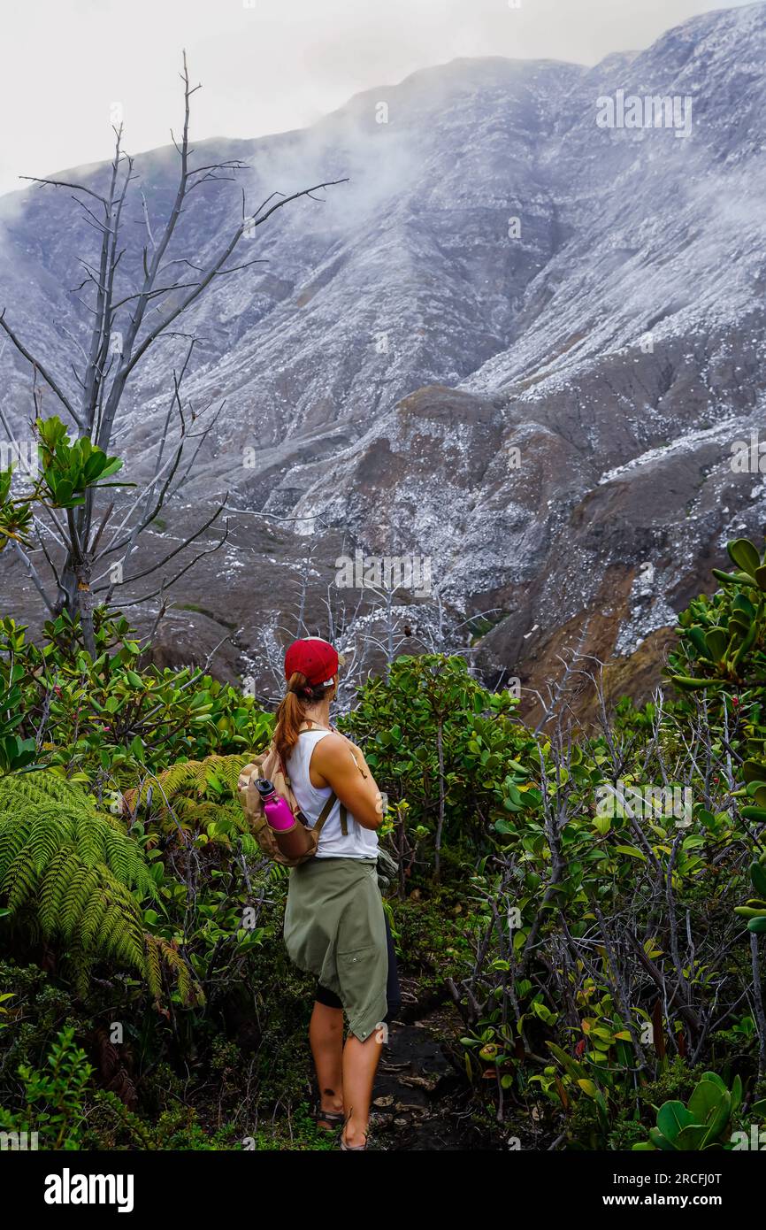 Beautiful adventurer woman hiking in the Poas Volcano Canon, mountains ...