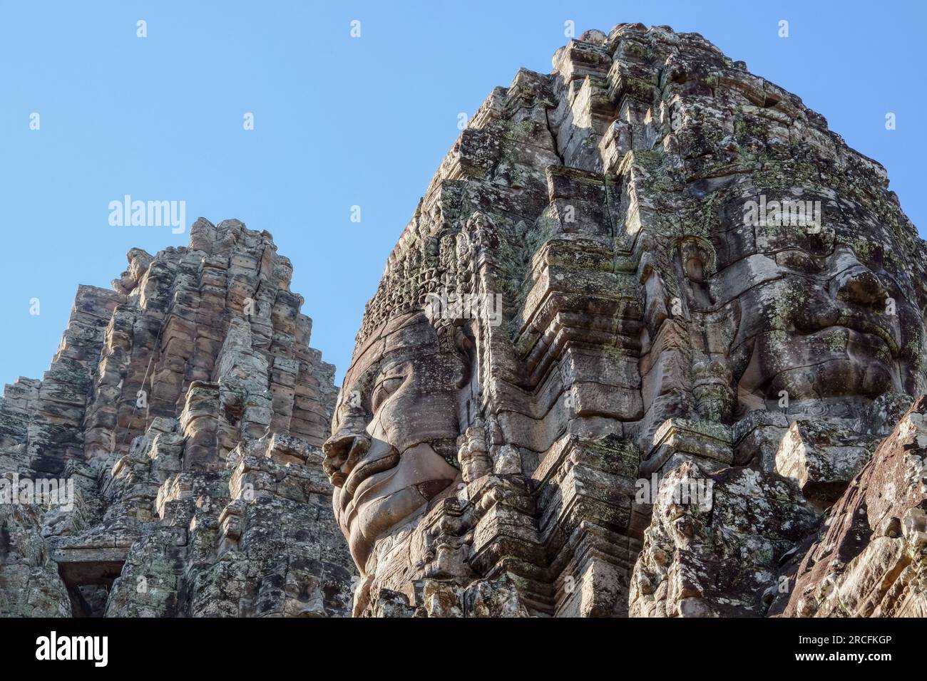 Image of the Bayon Temple's towers, showcasing intricate stone human ...