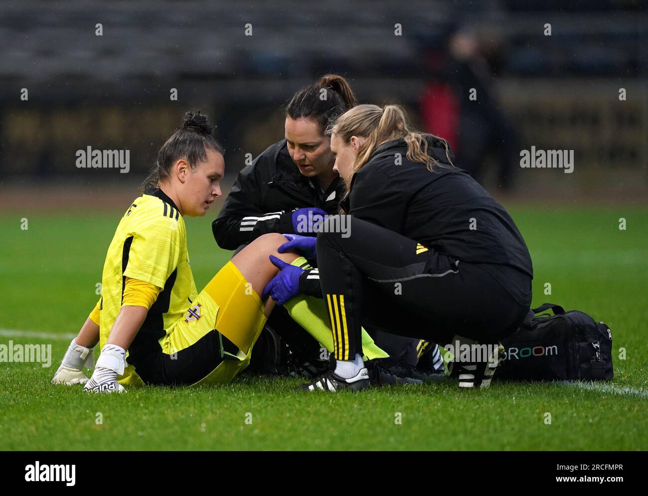 Northern Ireland goalkeeper Shannon Turner receives treatment for an ...