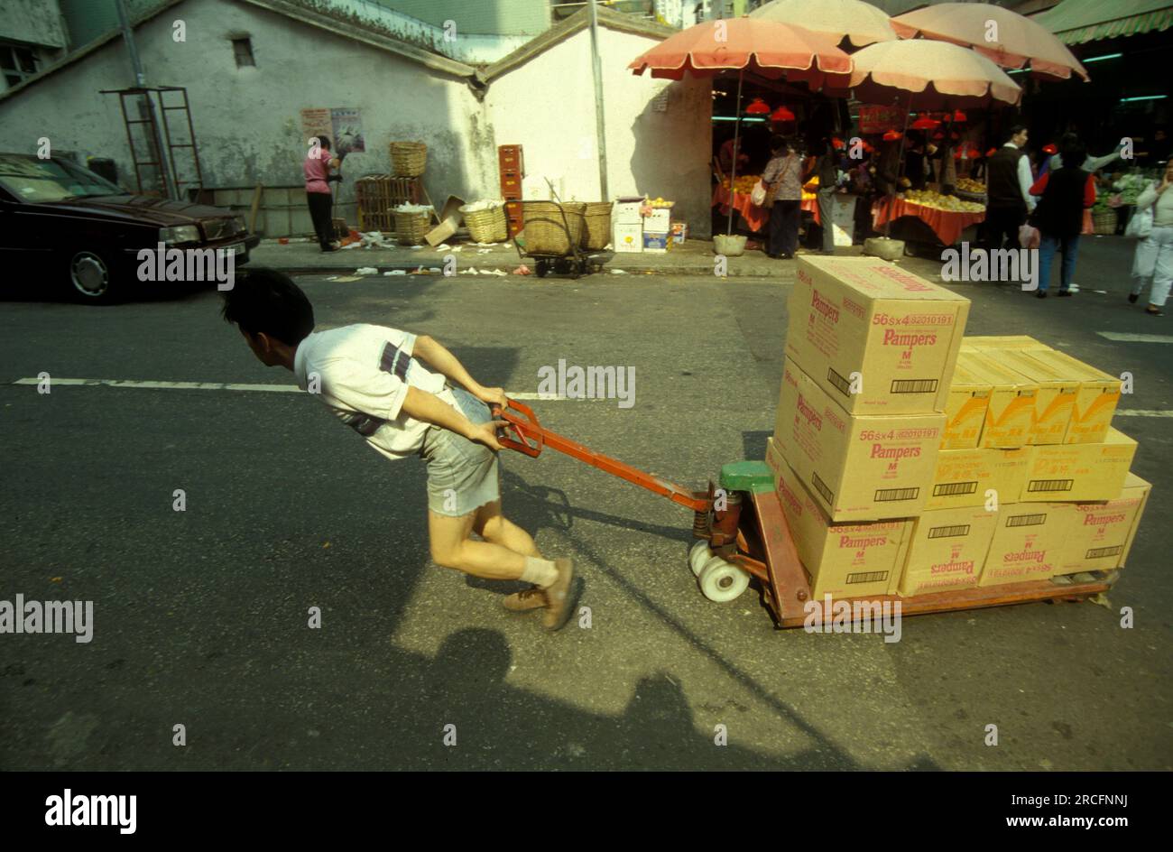 a men transport Pampers on a road at a market in the old Town in Tsim ...