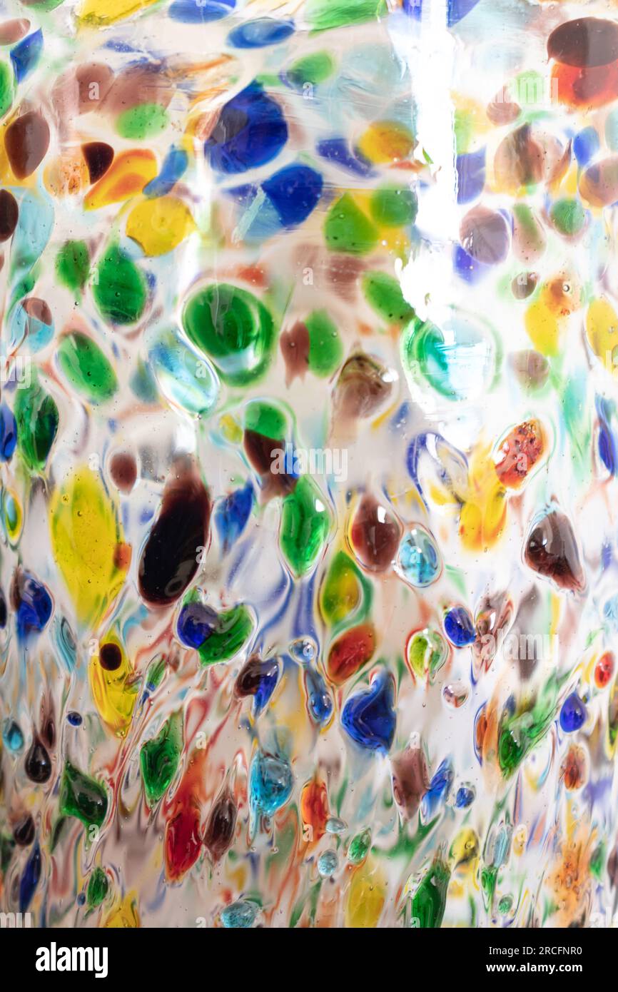 Background and colorful texture of blown glass with drops of different ...