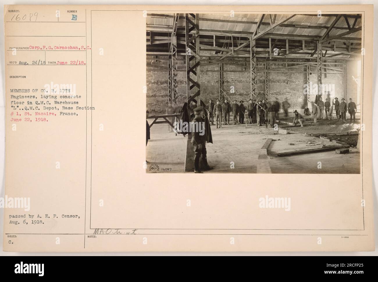Members of Co. B, 17th Engineers, laying a concrete floor in the Q.M.C ...