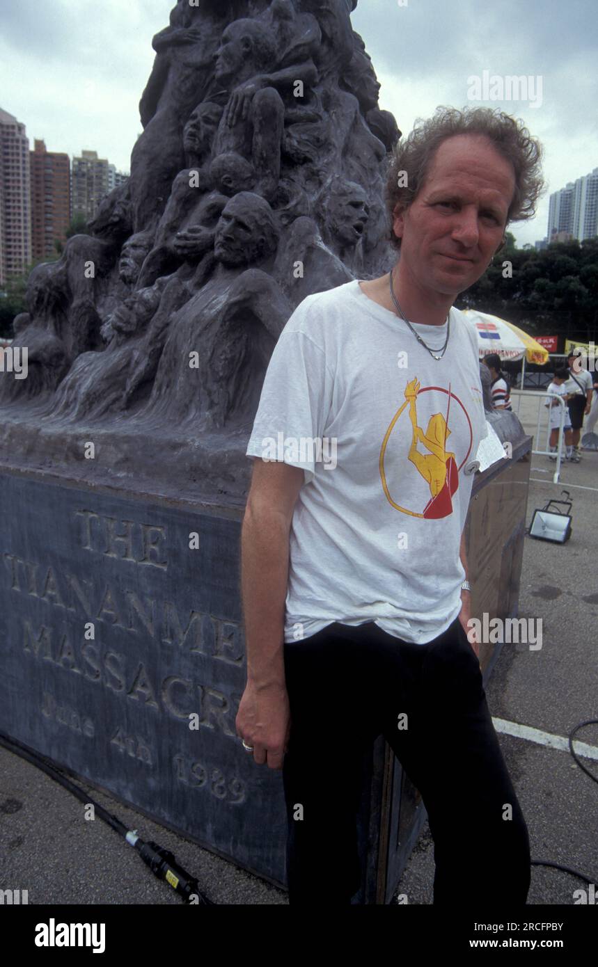 The Artitst Jens Galschiot from Danmark in front of his art, Pillar of ...