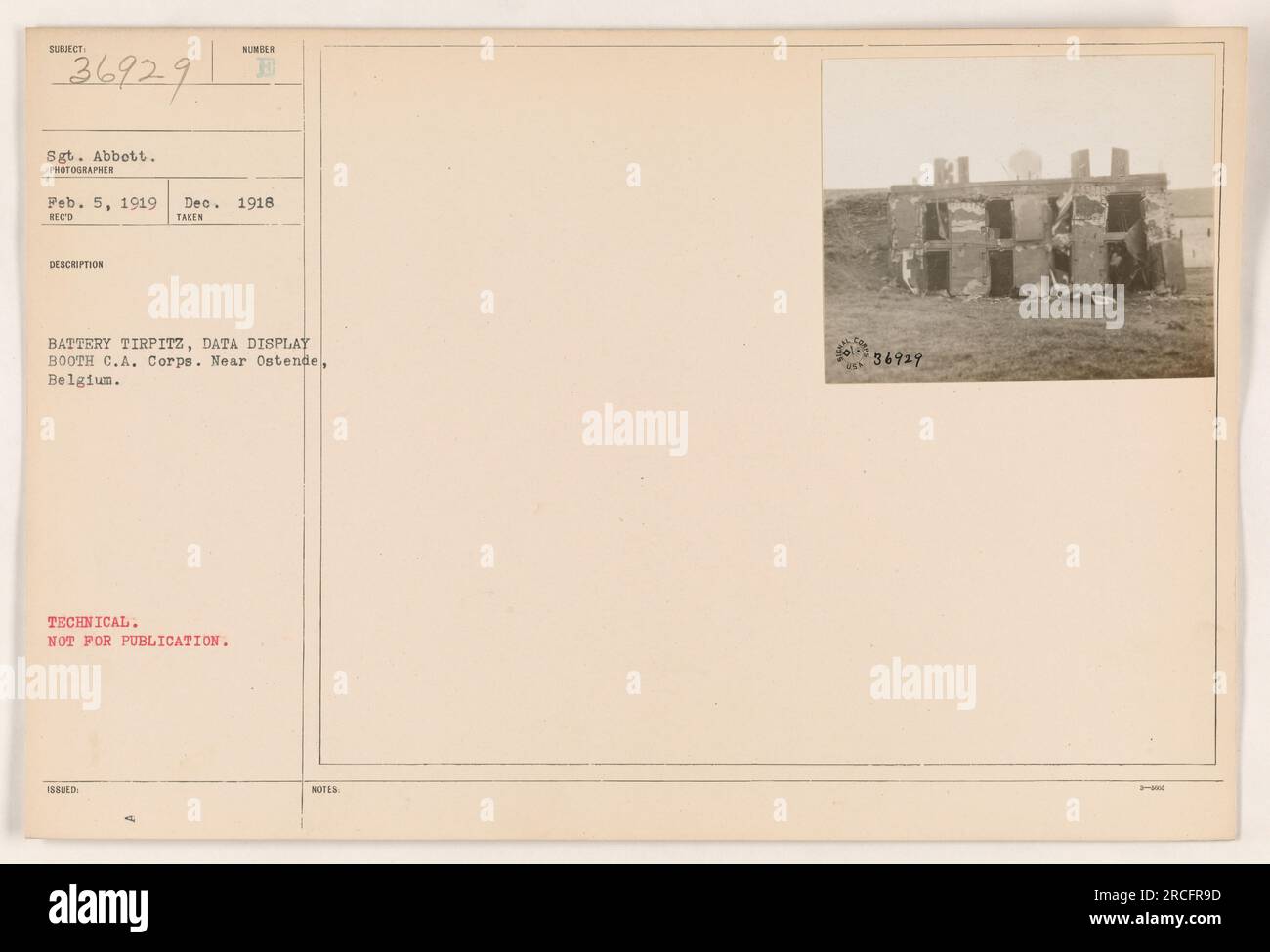 Sgt. Abbott stands in front of a display booth with the caption "Number ...