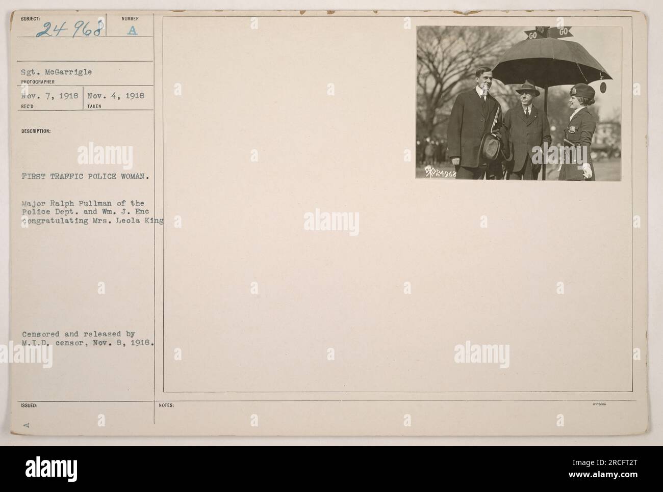 Female traffic police officer Leola King receiving congratulations from ...