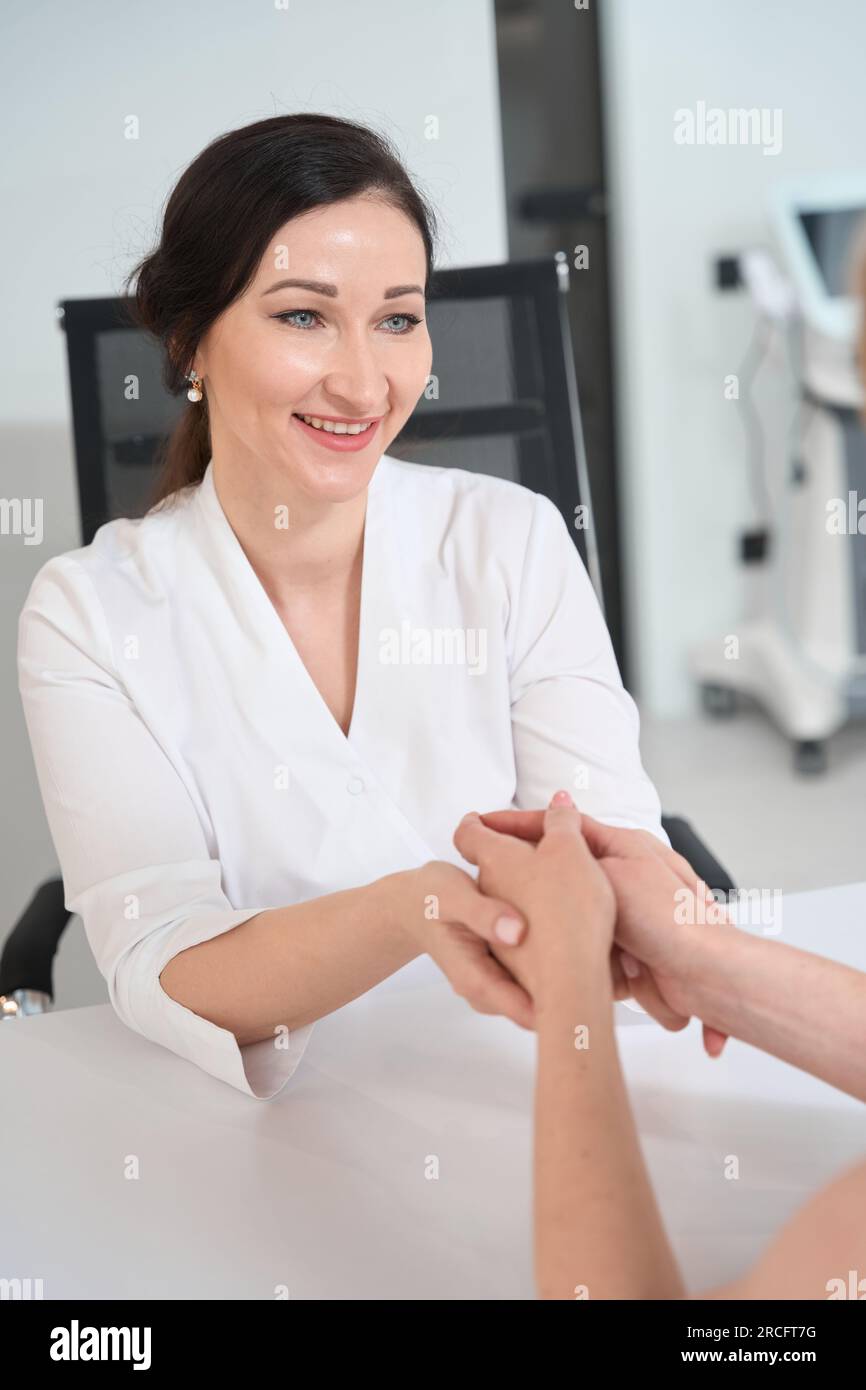 Doctor female non smiling hi-res stock photography and images - Alamy