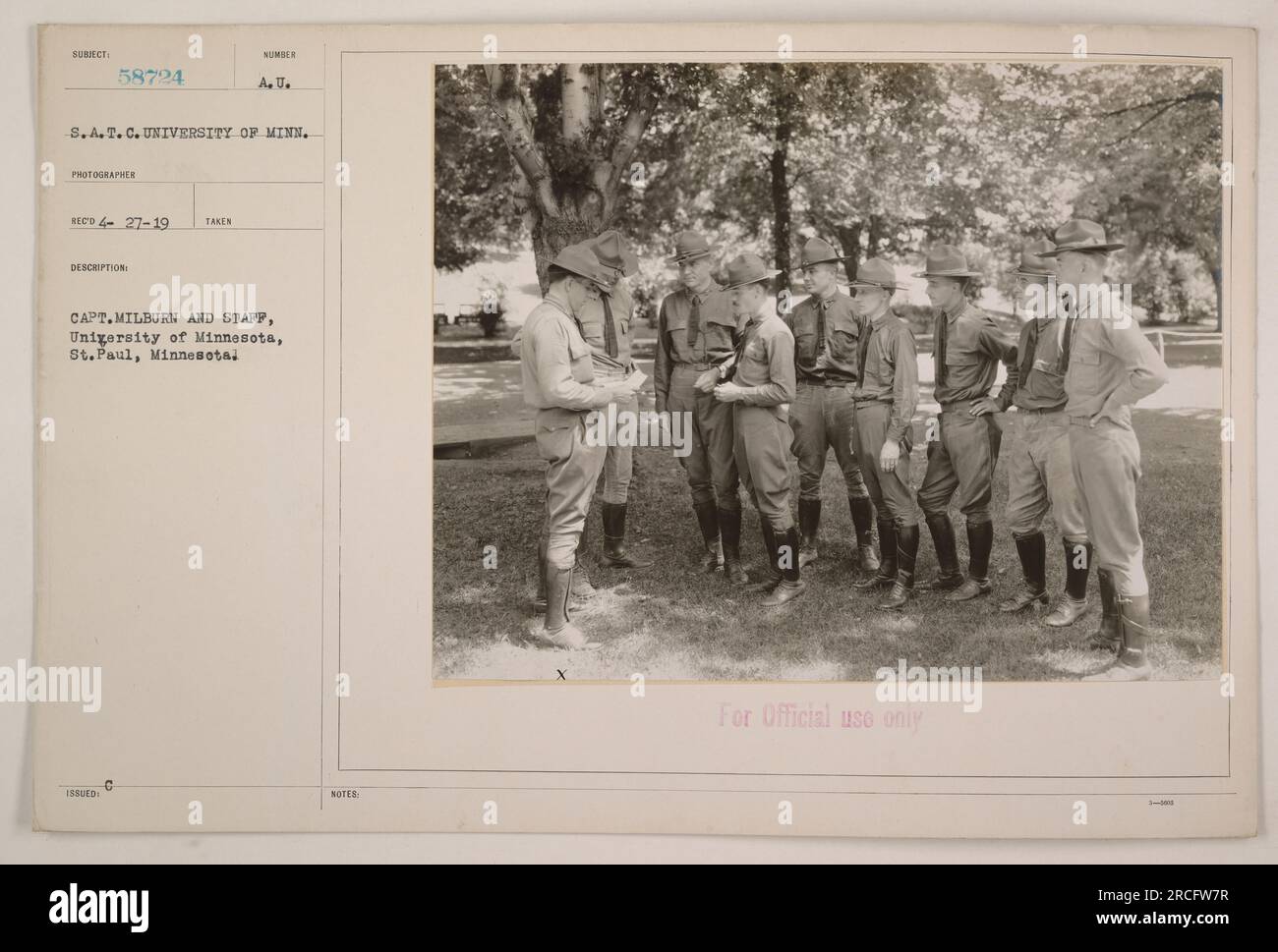 Caption: Capt. Milburn and his staff from the University of Minnesota ...