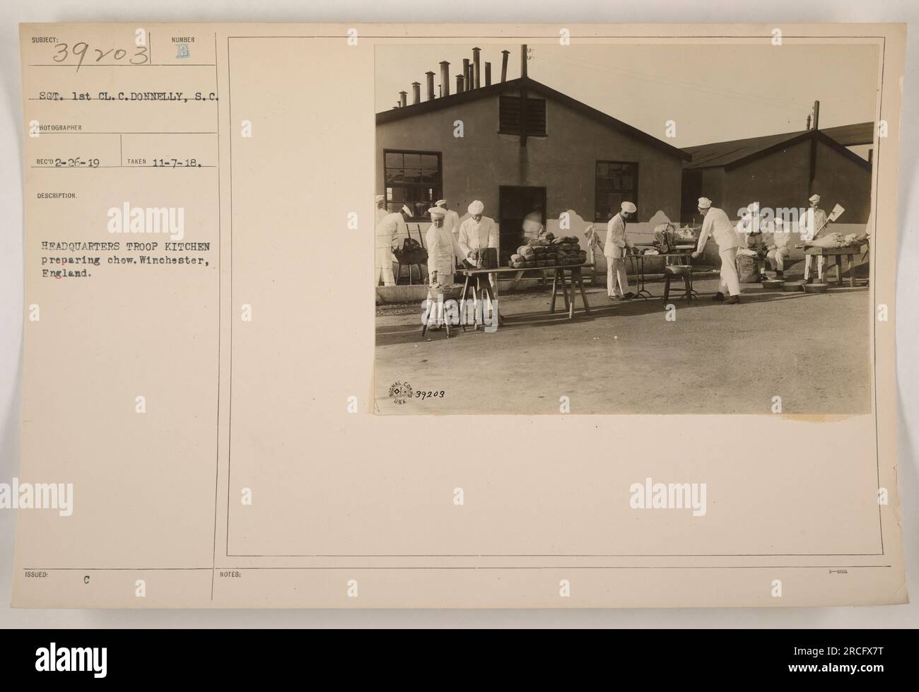 Troops in the kitchen preparing food at Winchester, England during ...