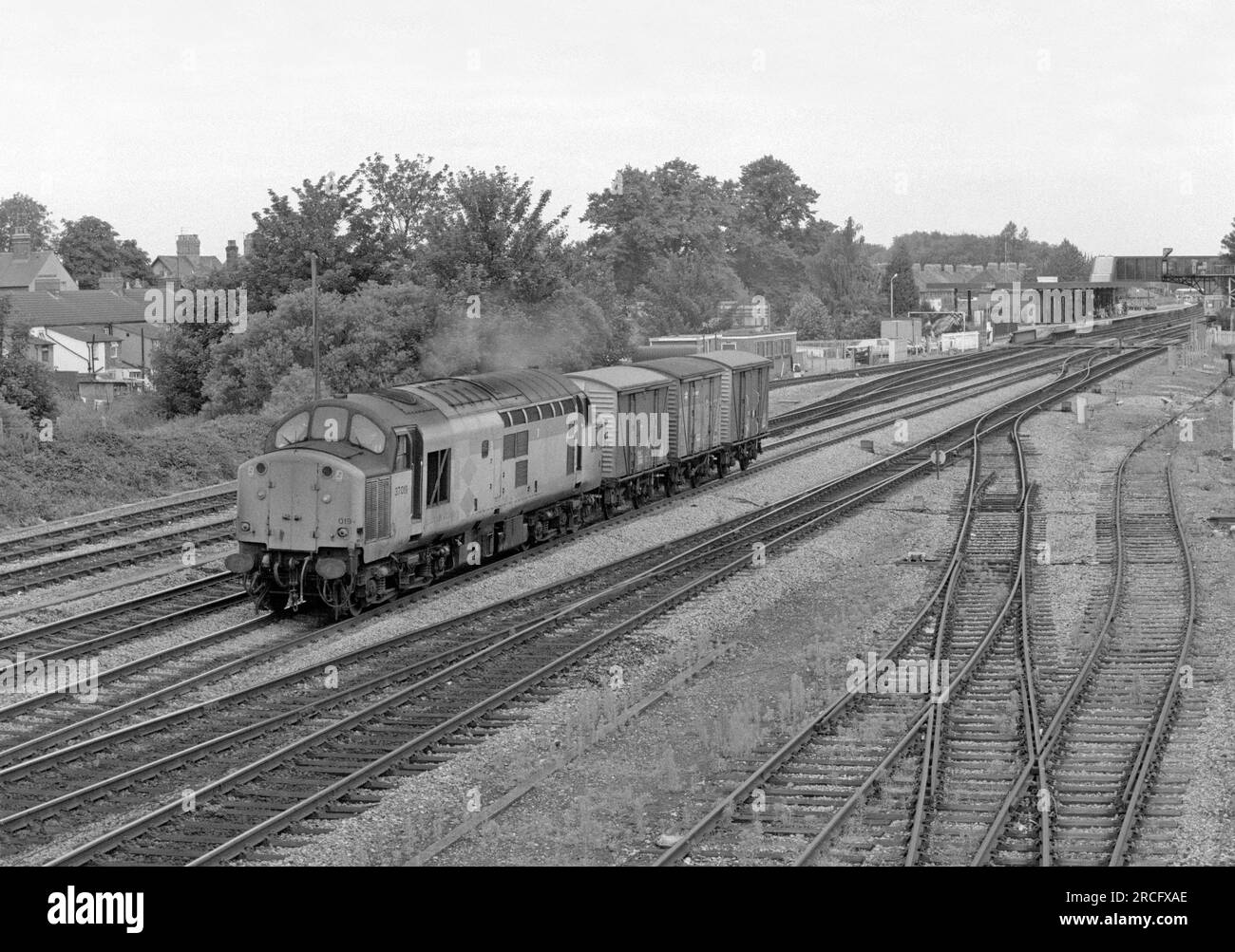 A Class 37 diesel locomotive number 37019 working a short MOD freight ...