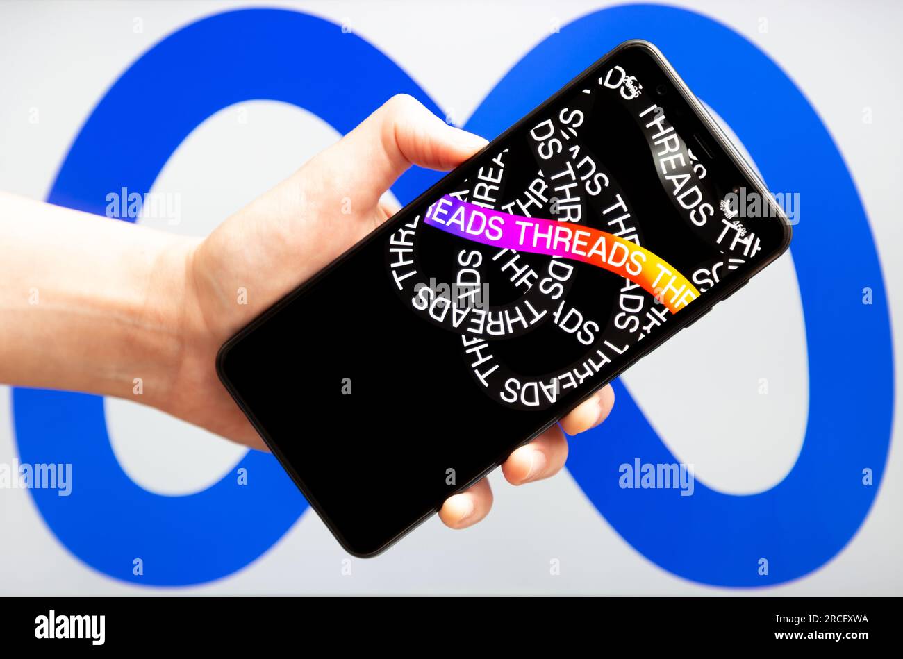 Ukraine, Odesa - July, 7 2023: Hand holding mobile with Threads app ...