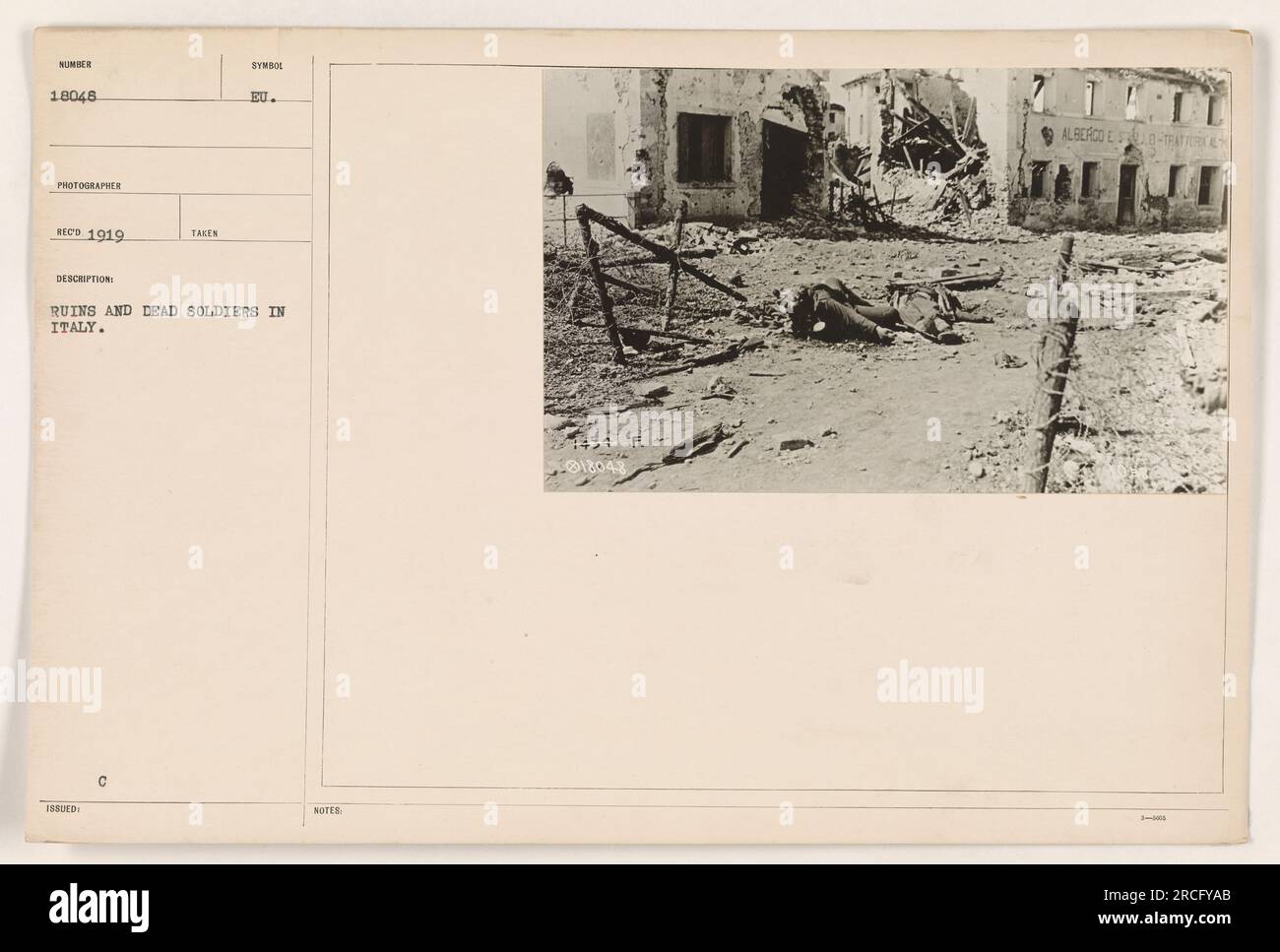 A photograph of ruins and dead soldiers in Italy during World War One ...