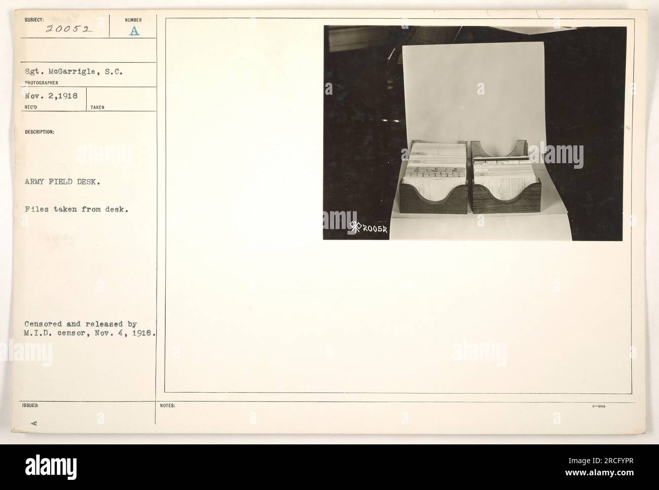 An American soldier, Sgt. McGarrigle, is pictured here with an army ...