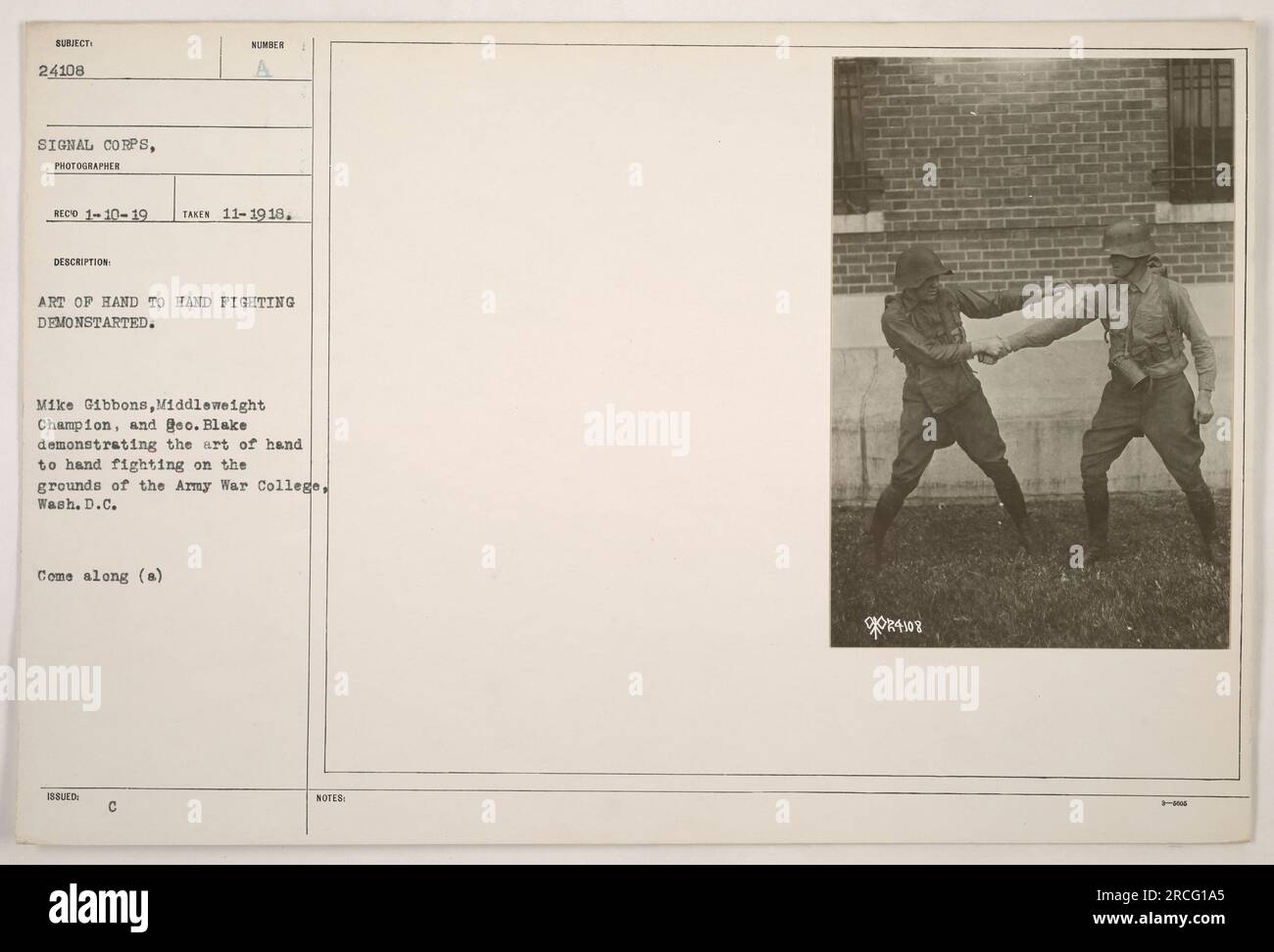 Mike Gibbons, Middleweight Champion, and George Blake demonstrating ...