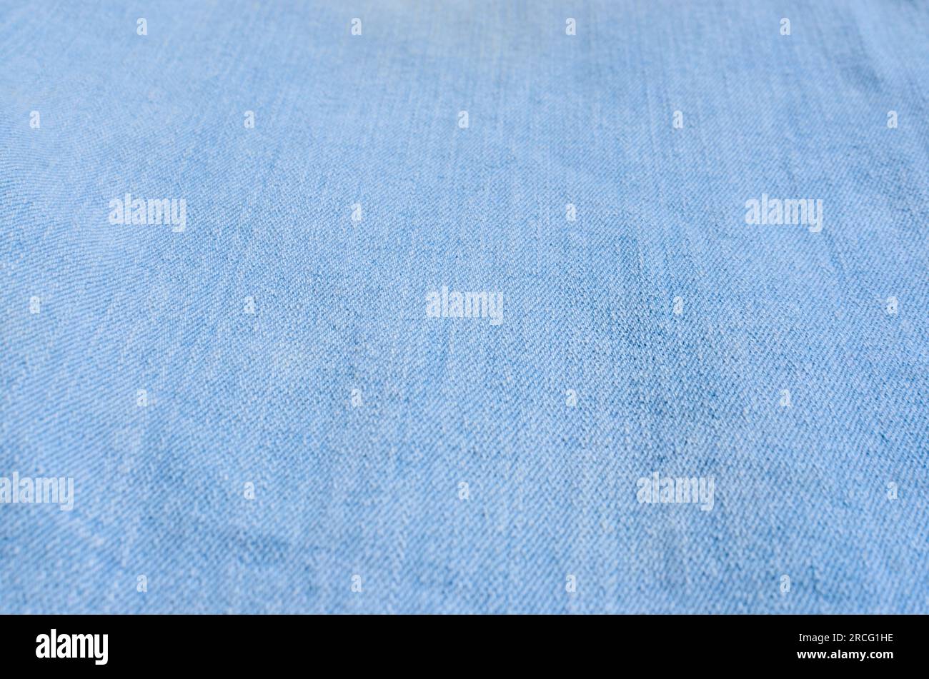 Close-up detail of denim texture with intertwined lines, revealing the ...