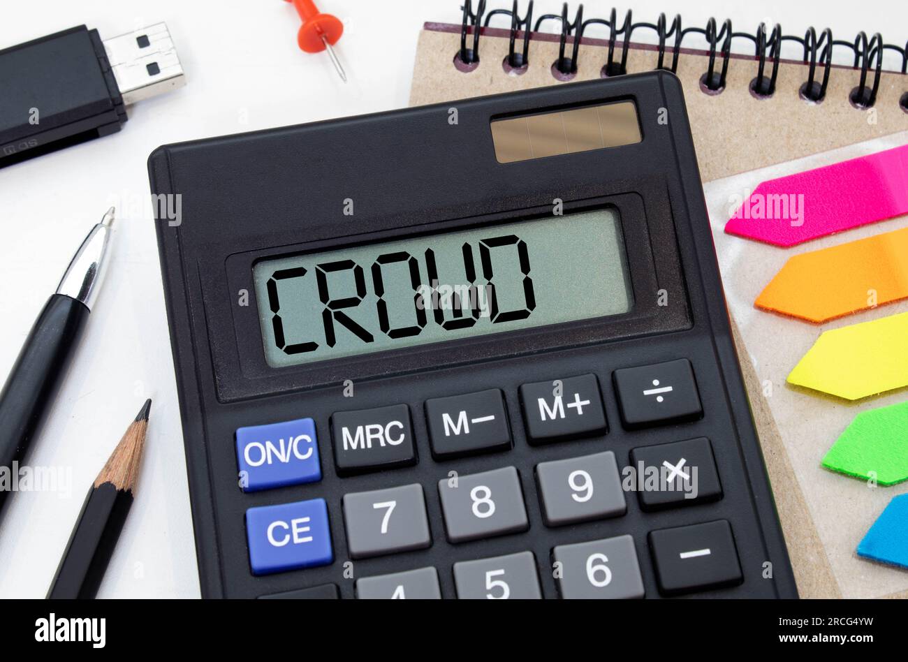 word crowd made from wooden letters lies on a yellow table Stock Photo ...