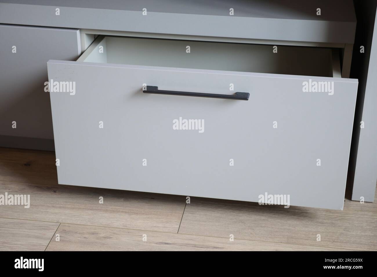 top view of a opened empty drawer Stock Photo - Alamy