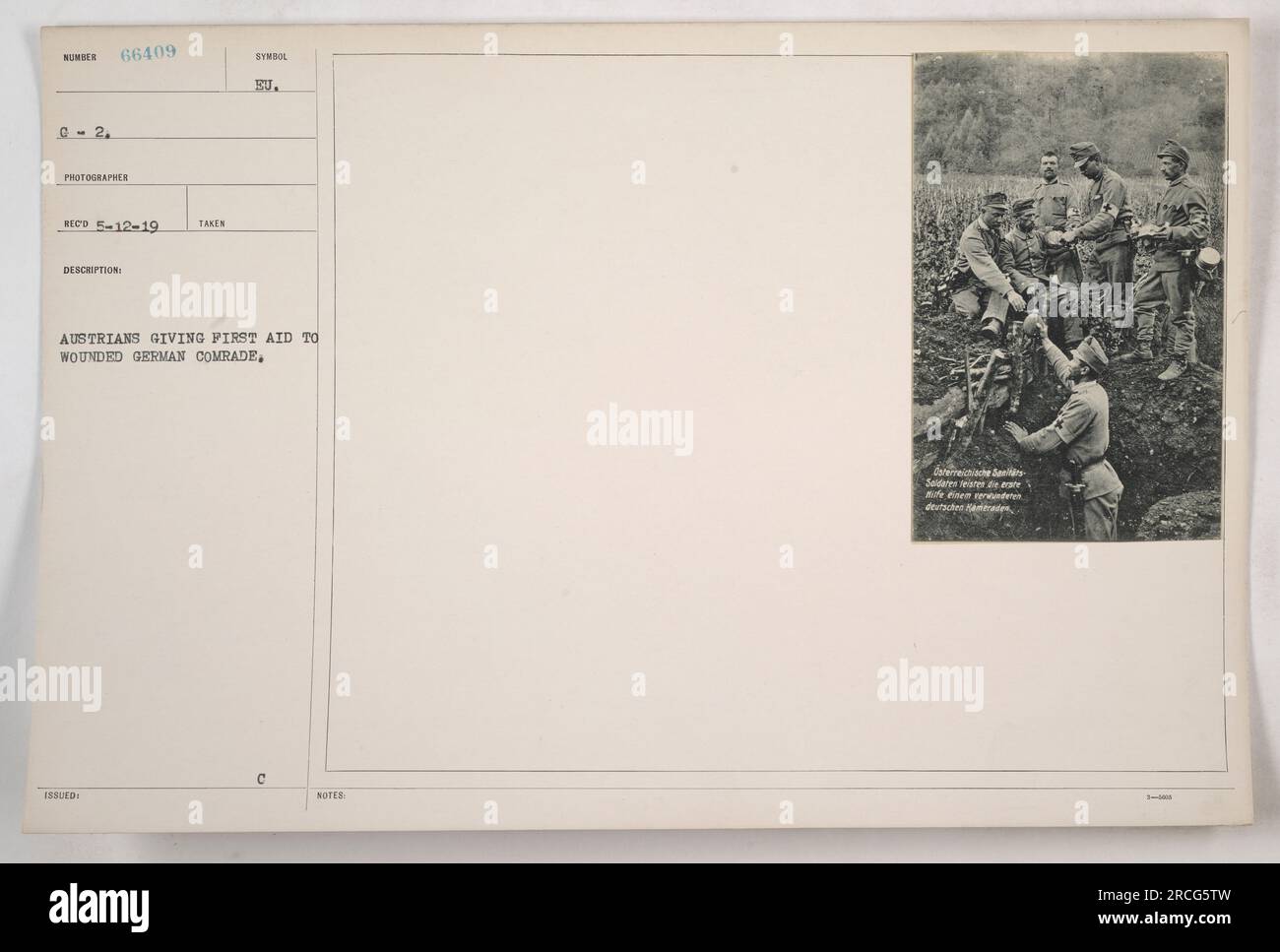 A photograph capturing Austrians rendering first aid to a wounded ...