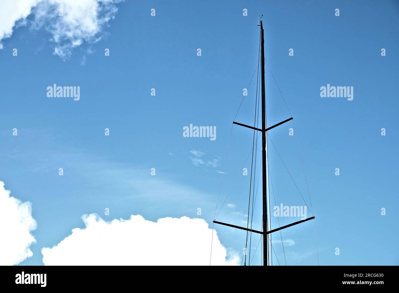 Black carbon mast and spreaders (crosstrees) or a racing sailboat ...