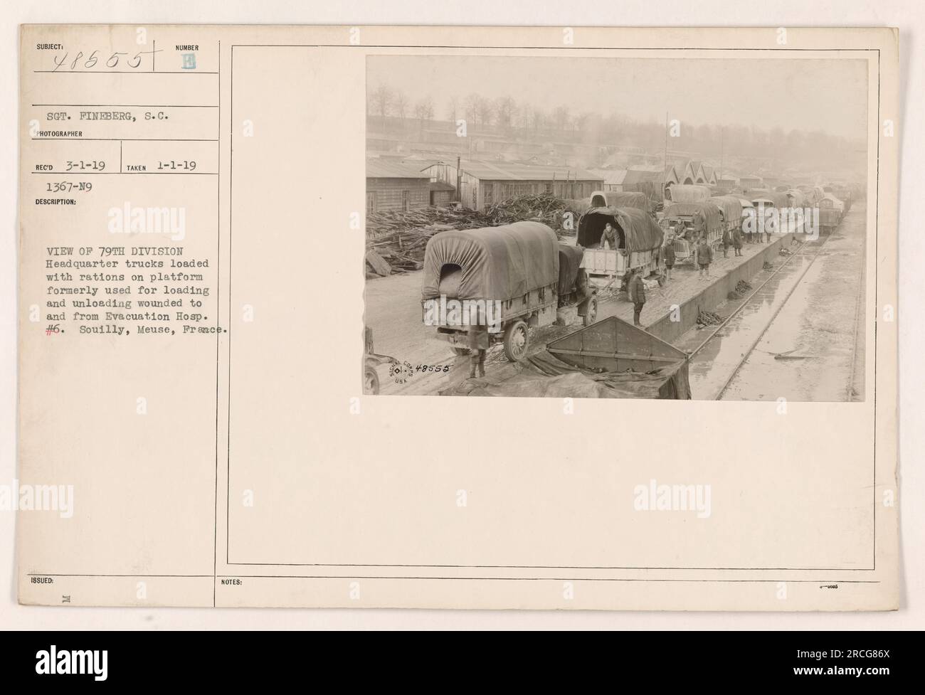 Trucks belonging to 79th Division Headquarters are seen loaded with ...