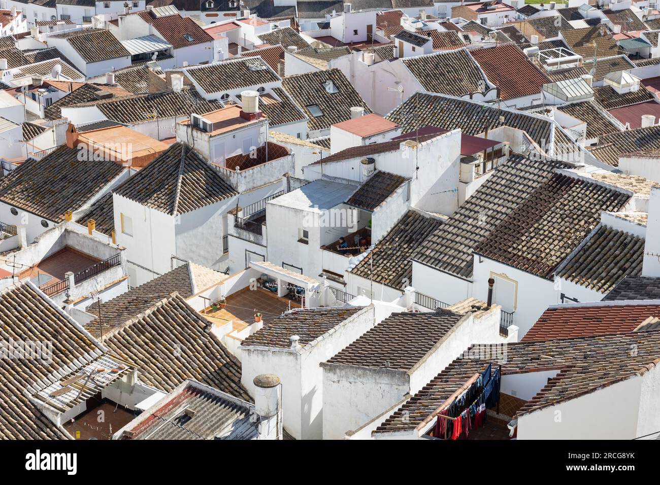 Aerial panoramic view of rooftops of white houses of Olvera town ...