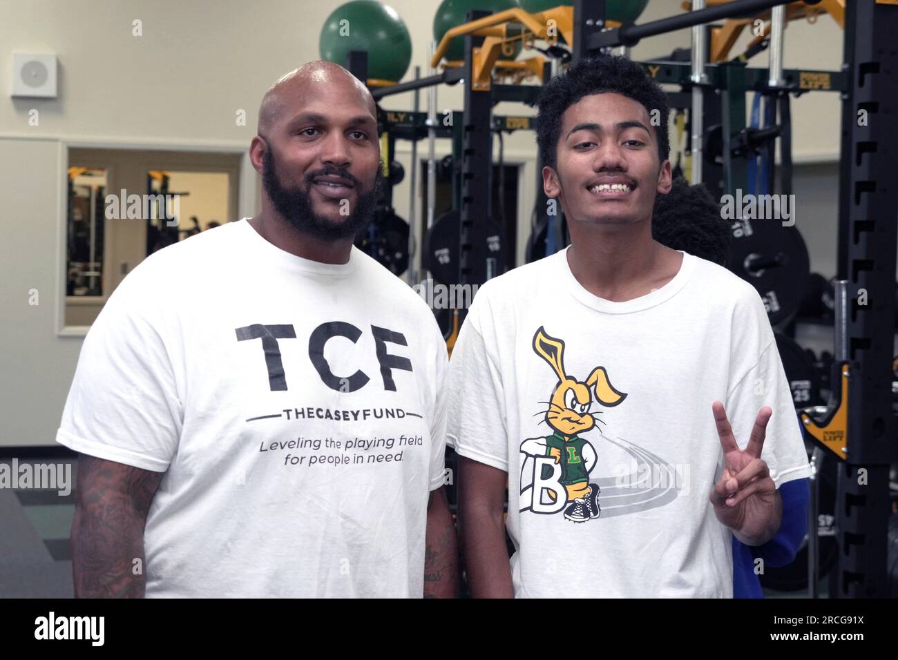 Jurrell Casey poses during unveiling of the weight room at Long Beach ...