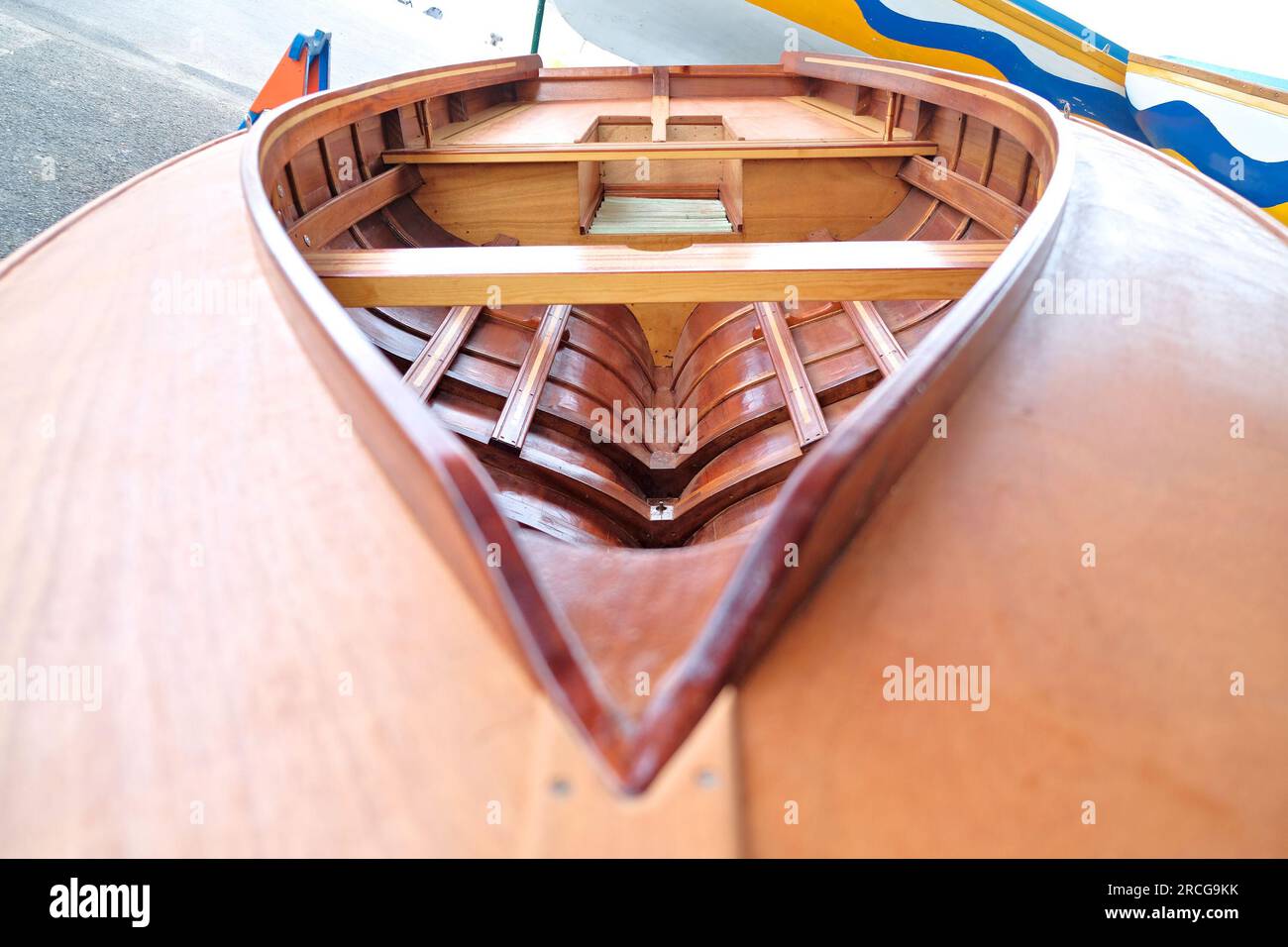 Bow view into the cockpit of a small classic wooden racing boat Stock ...