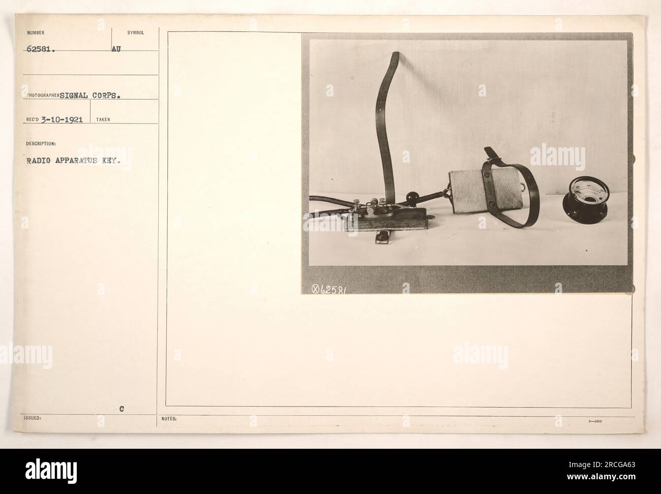 Image shows a close-up view of a radio apparatus key, with the symbol ...