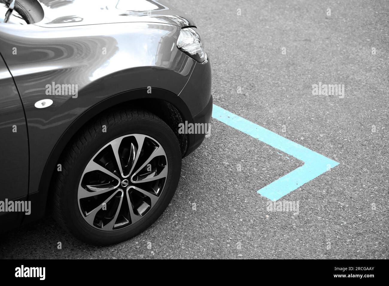Front section of a silver car parked in a marked residential area Stock ...