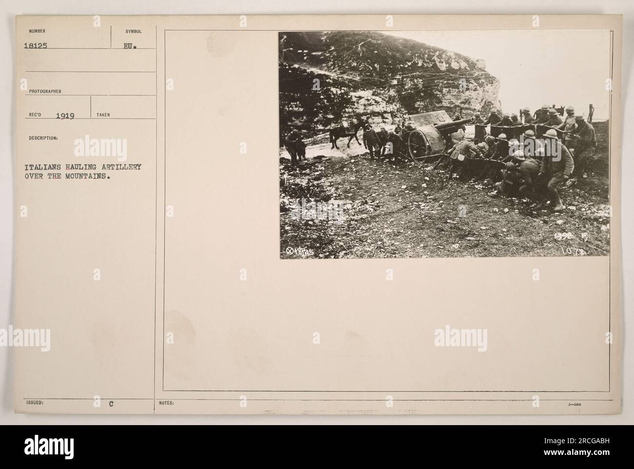 Italian soldiers are seen hauling artillery over the mountains during ...