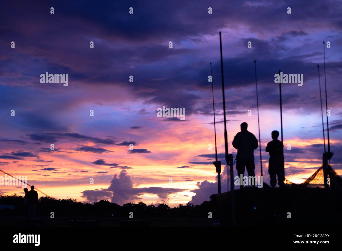 U.S. Marines with Marine Air Control Squadron 4 watch the sun set ...