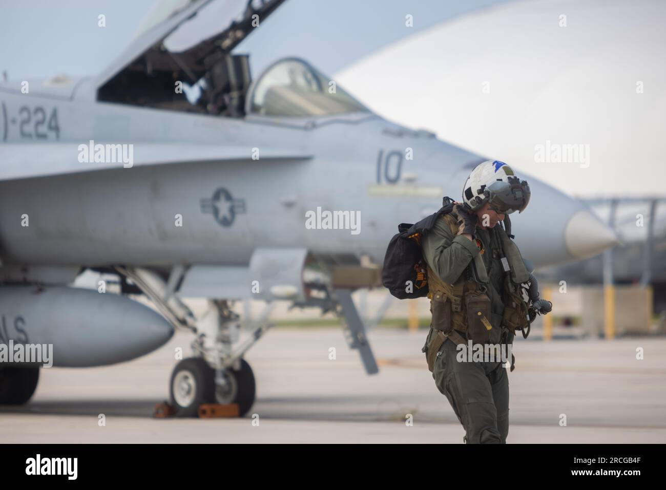 A U.S. Marine Corps F/A-18 Hornet pilot with Marine All Weather Fighter ...