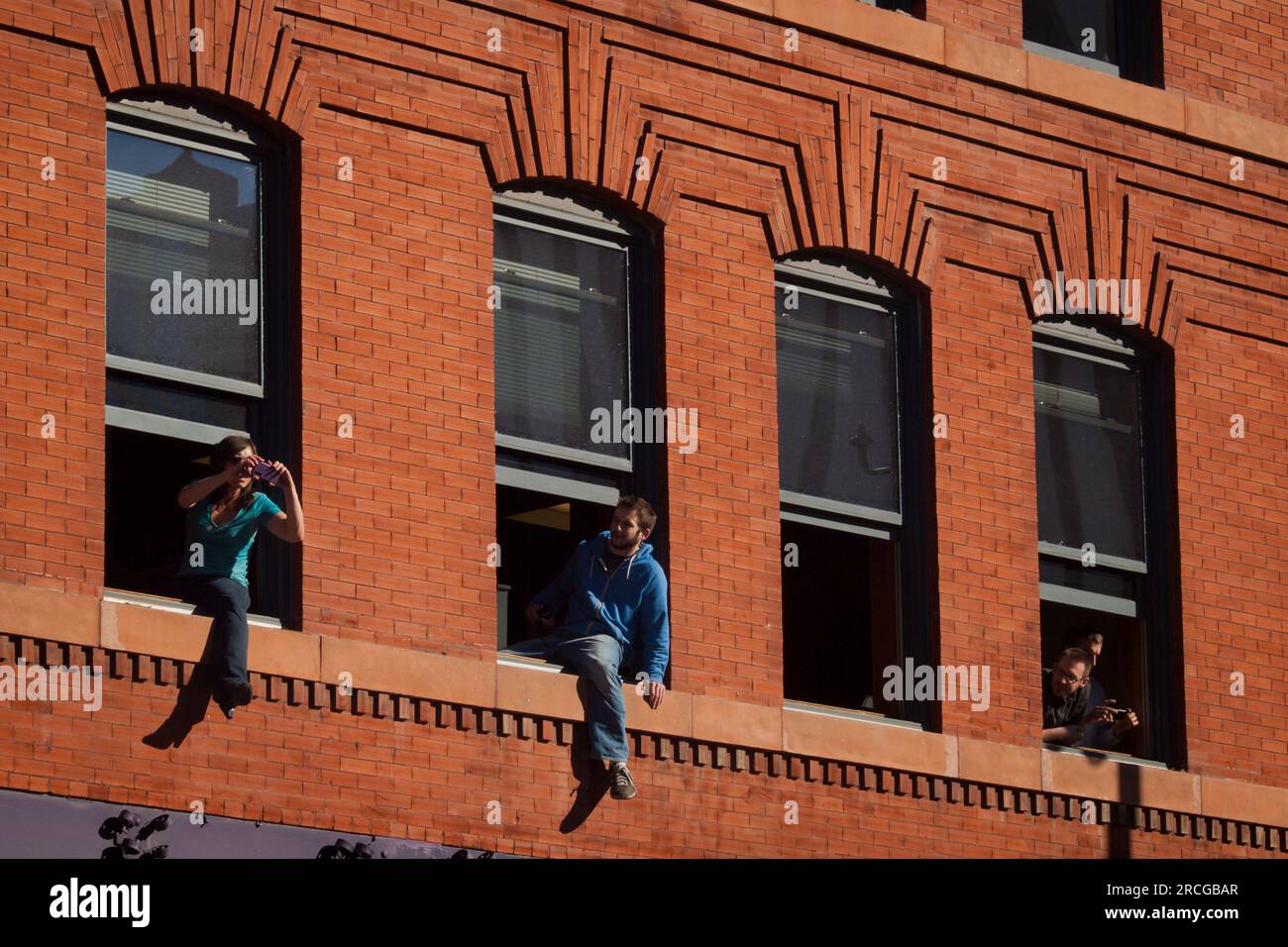 Business people in windows Stock Photo - Alamy