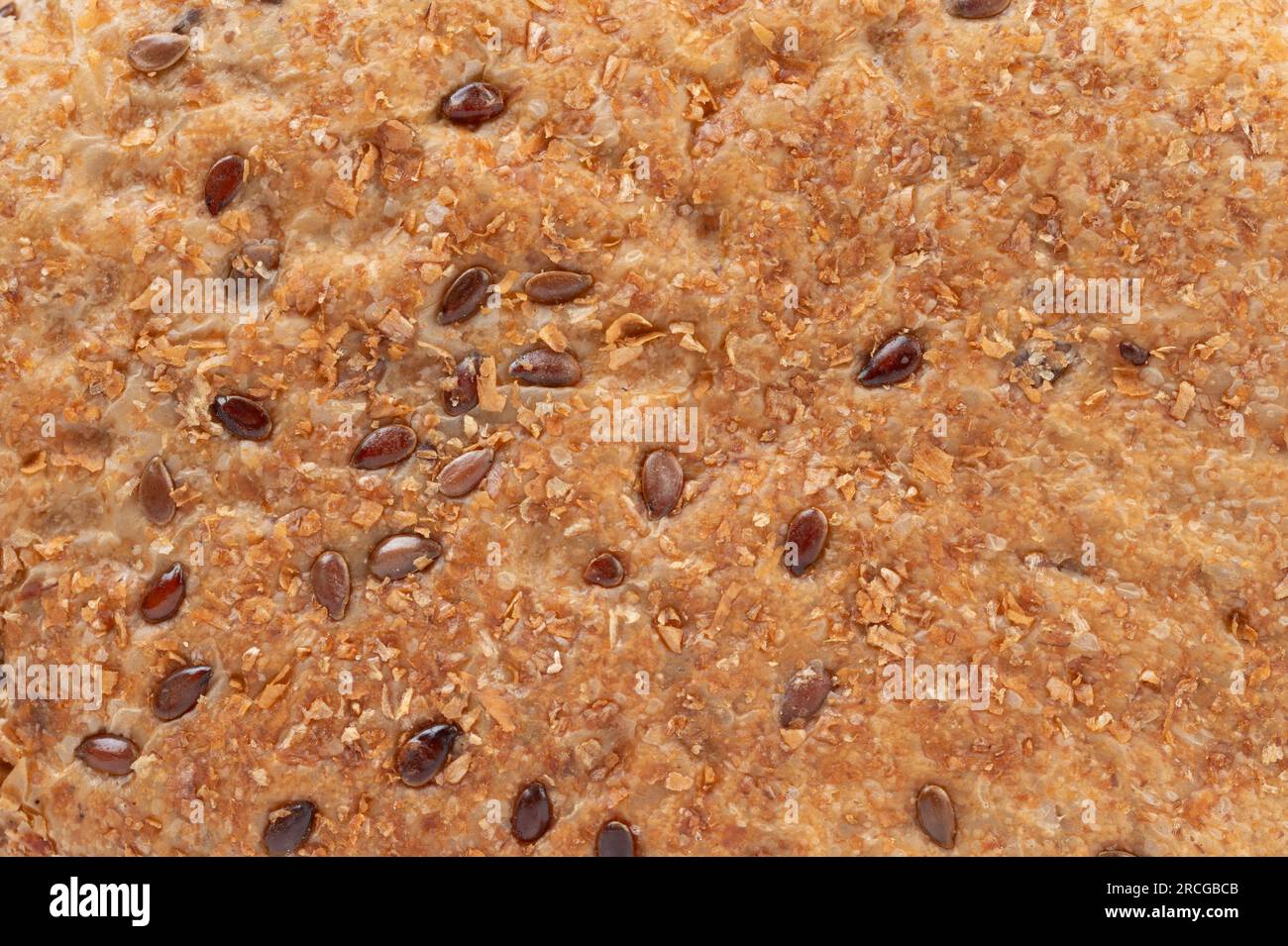 Bread brown crusty texture with seed macro close up view Stock Photo ...