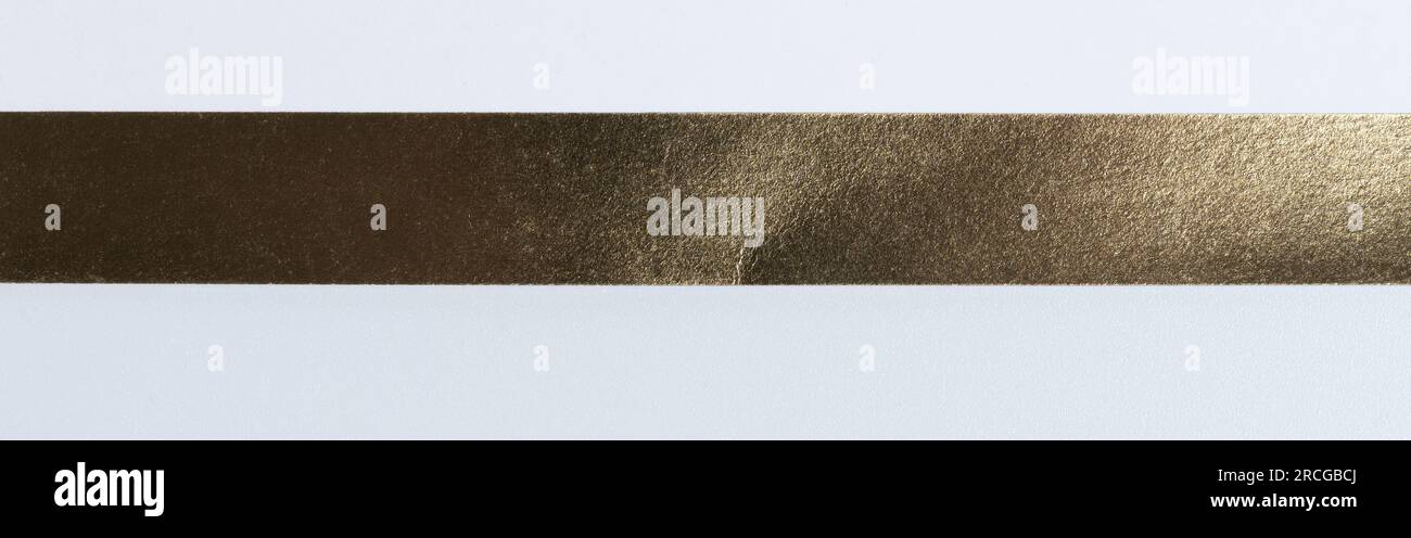 Narrow gold color stripe isolated on white studio background Stock ...
