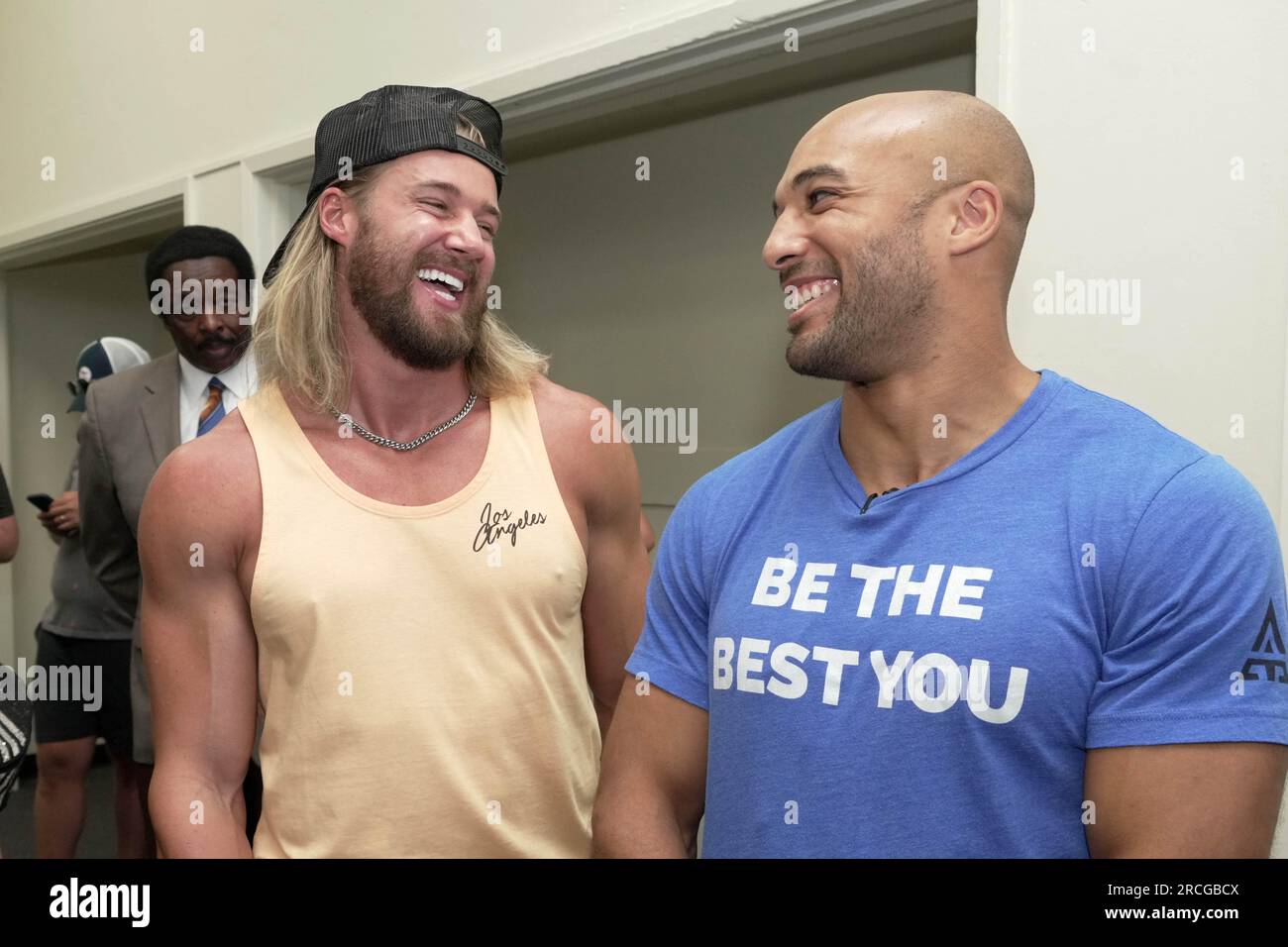 Hunter Clowdus (left) and Los Angeles Chargers running back Austin ...